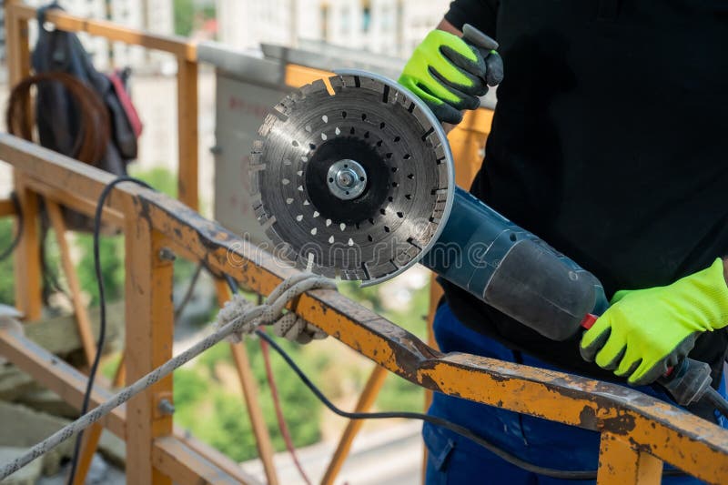 The Master Uses a Diamond Blade at a Construction Site. Stock Photo ...