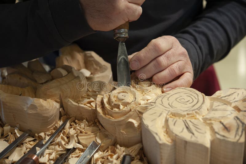 Master Woodcarver at Work. Wood Shavings, Gouges and Chisels on the ...