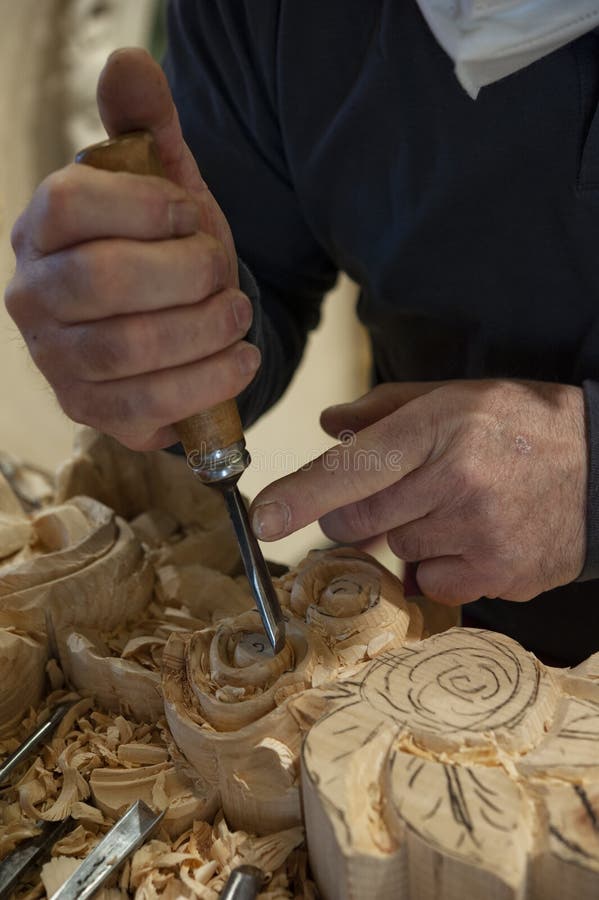 Master Woodcarver at Work. Wood Shavings, Gouges and Chisels on the ...