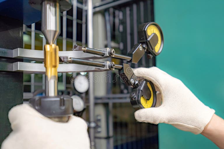 The Master Worker Checks the CNC Cutting Tool at the Centers for Runout ...