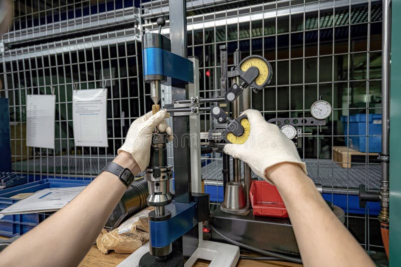 The Master Worker Checks the CNC Cutting Tool at the Centers for Runout ...