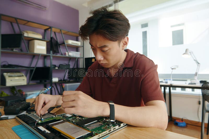 Master Working with Broken Laptop in Workshop Stock Photo - Image of ...