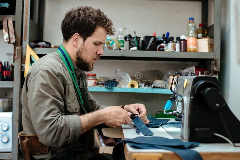 A Master Works with Genuine Leather in the Workshop Stock Image - Image ...