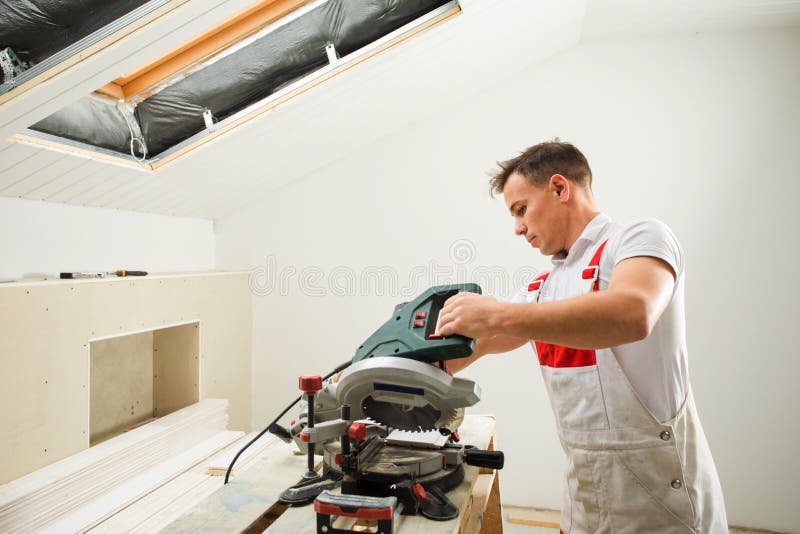 The Master Works with a Special Tool is Processing Boards Stock Image ...