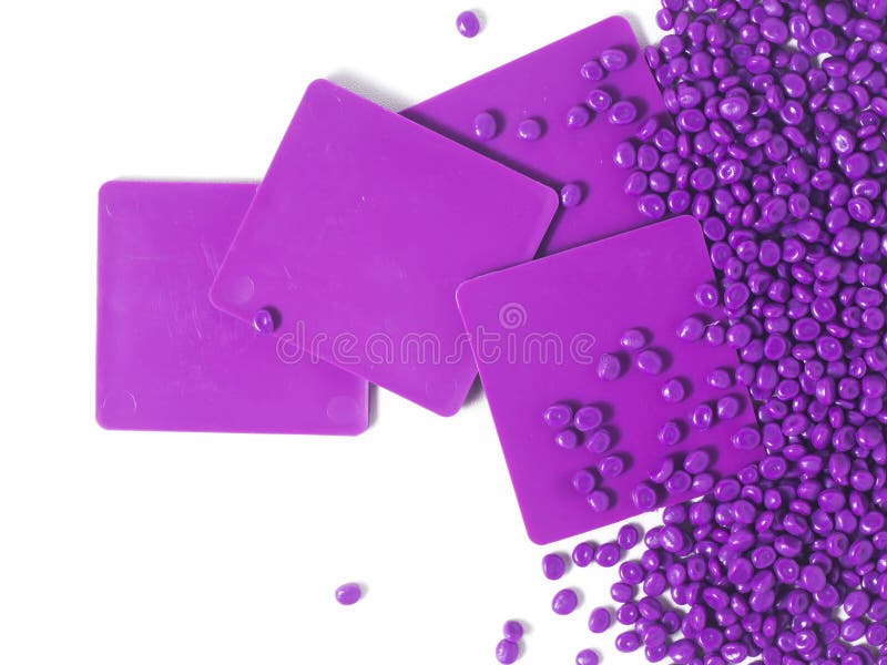 Masterbatch Polymer Granules and Purple Color Chips on a White ...