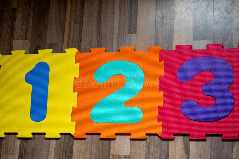 A Mat Puzzle with the Numbers One Two and Three Stock Photo - Image of ...