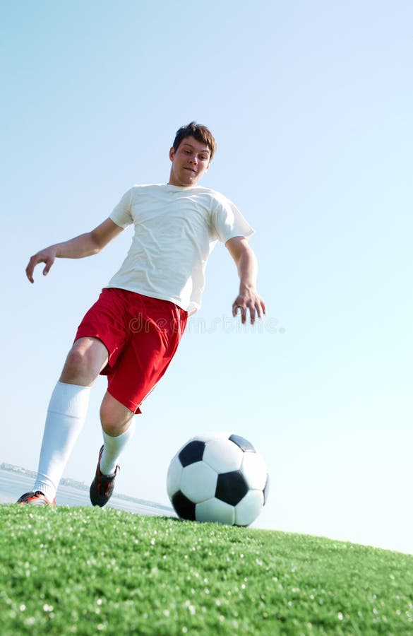 Footballer screaming stock image. Image of grass, match - 19924937