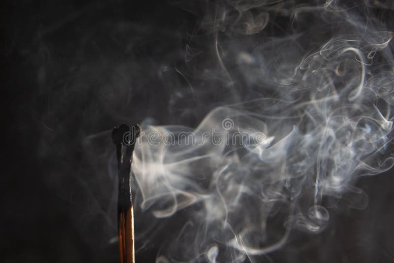 A Match Burned and Extinguished with a Thread of Smoke Stock Photo ...