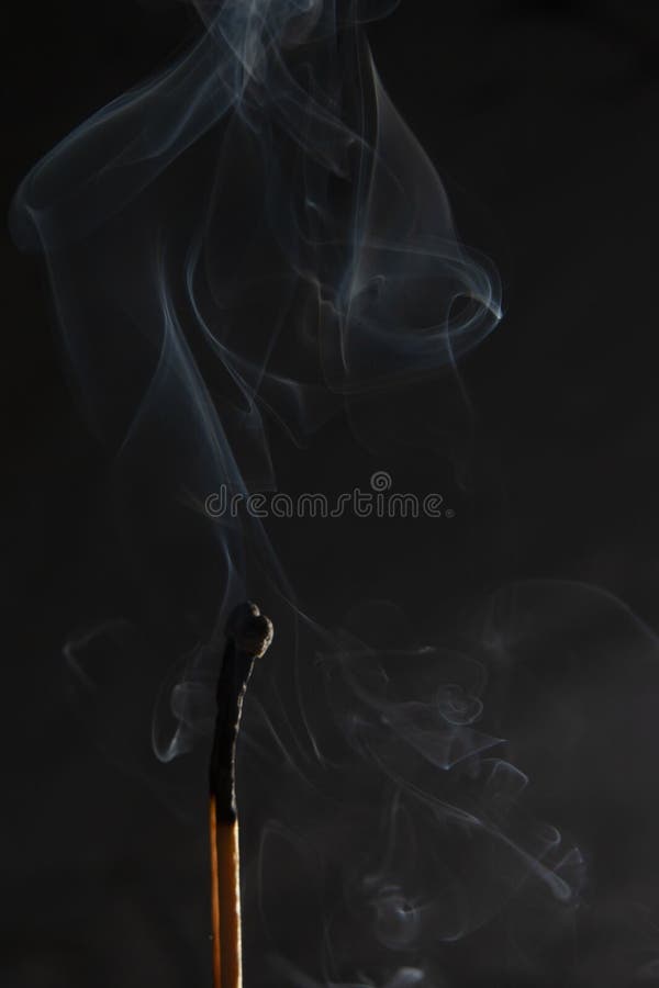 A Match Burned and Extinguished with a Thread of Smoke Stock Photo ...