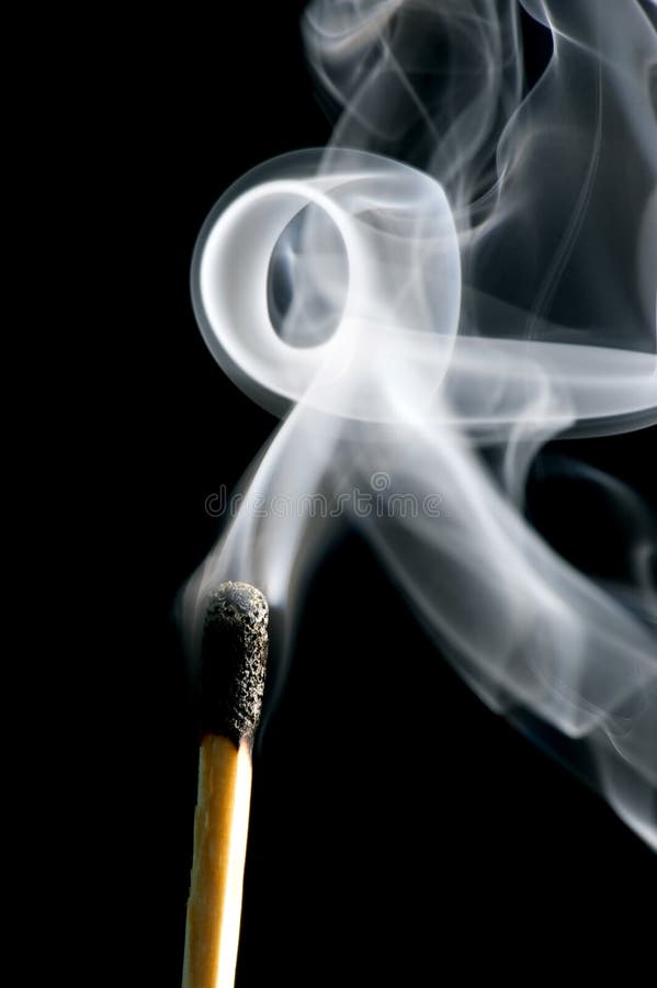 Match with smoke on black stock photo. Image of glowing - 7907428
