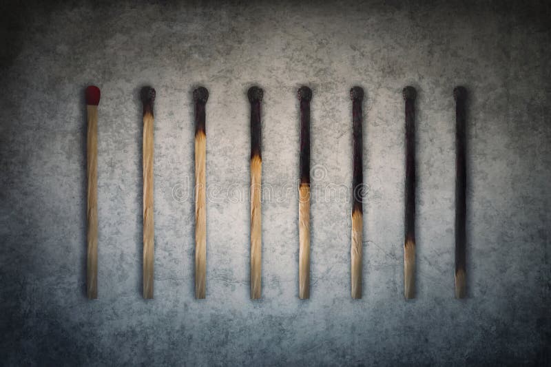 Match Sticks Burnt at Different Stages Arranged in Shape of a ...