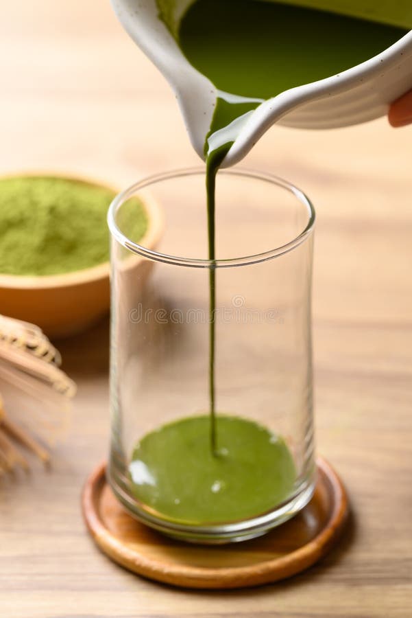 Matcha Green Tea in Tea Bowl Pouring in Glass Stock Image - Image of ...