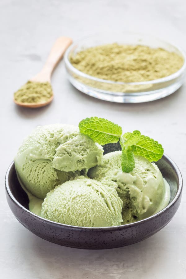 Matcha Green Tea Ice Cream Balls in a Black Bowl, Vertical Stock Photo ...
