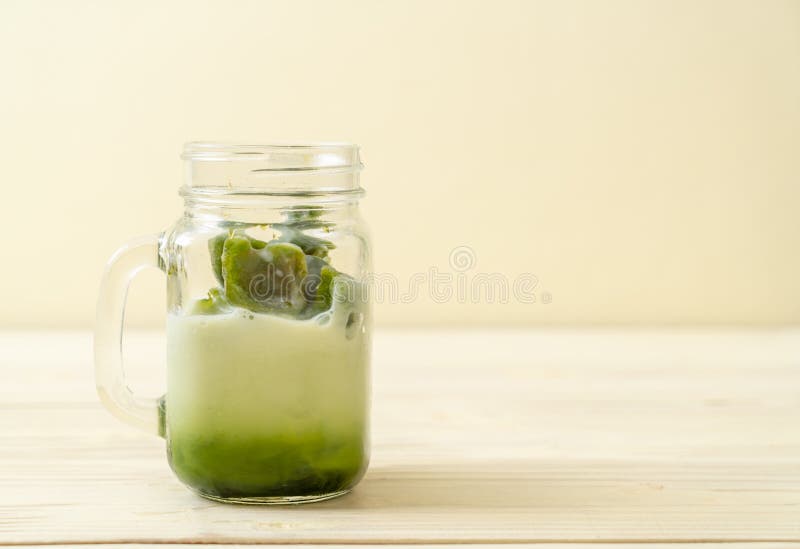 Matcha Green Tea Ice Cube with Milk Stock Photo - Image of pouring ...