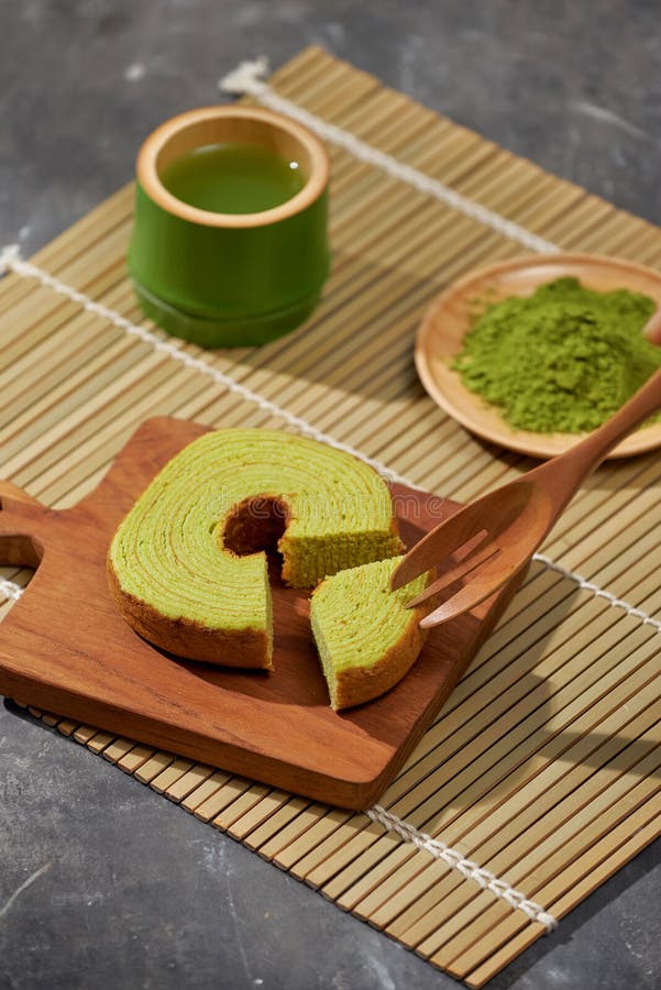 Matcha Green Tea Latte in a Cup and Tea Ceremony Utensils with German ...