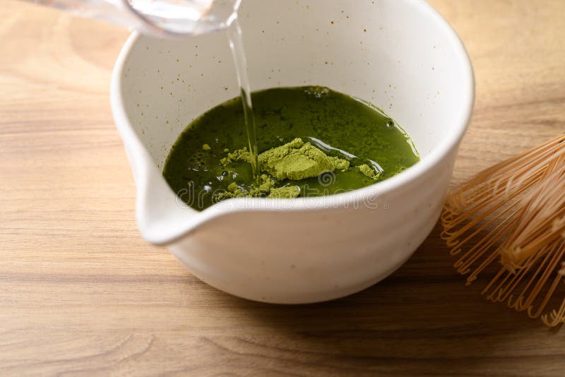 Matcha Green Tea Powder Mixing with Water in Tea Bowl Stock Image ...