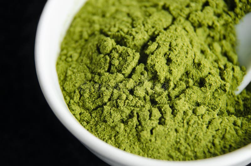Matcha Green Tea Powder in a White Bowl, Close Up. Selective Focus ...