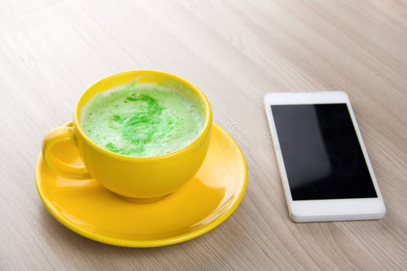 Matcha tea and smartphone stock image. Image of acid - 139291277