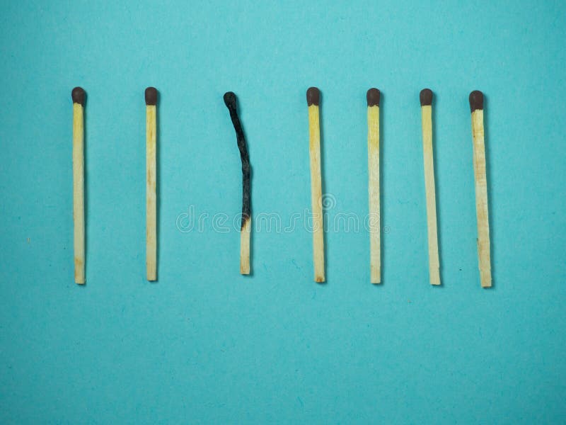 Matches on a Blue Background. One Against All. Burnt Match Stock Photo ...