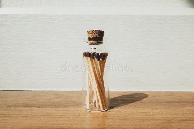 Matchstick in Glass Bottle on Wooden Floor. Stock Photo - Image of fire ...