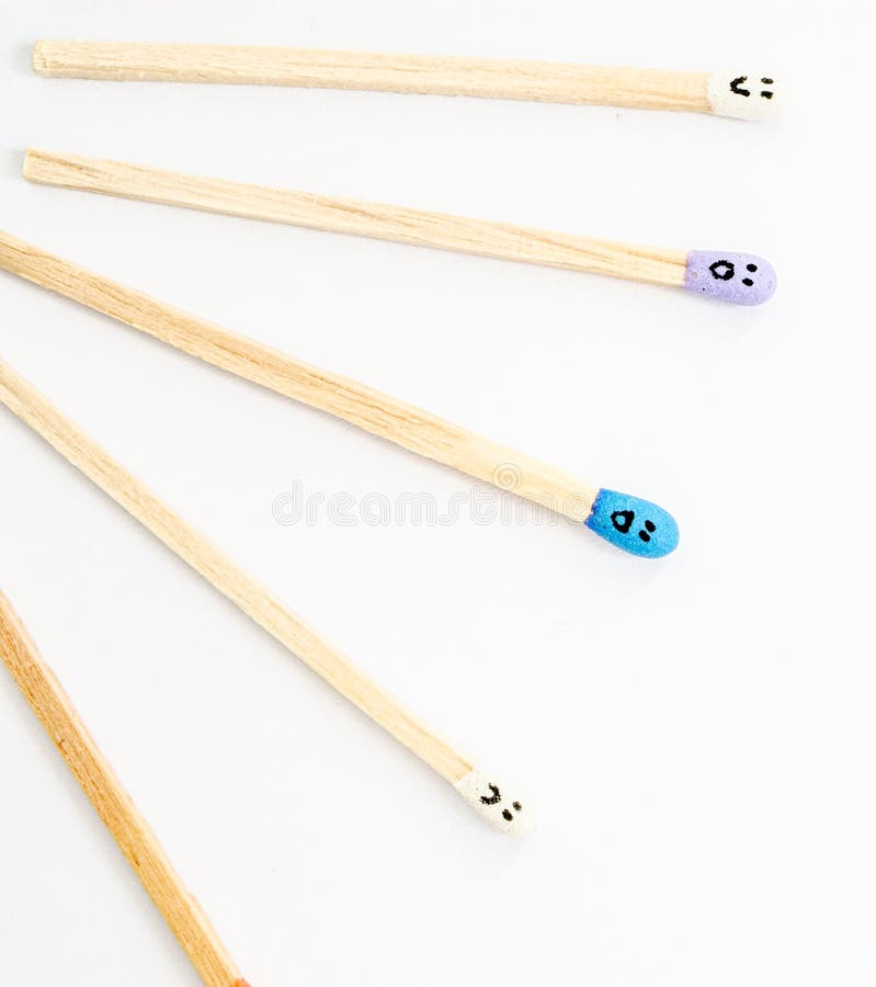 Matchsticks with Faces Painted on the Heads on Old Paper Stock Photo ...