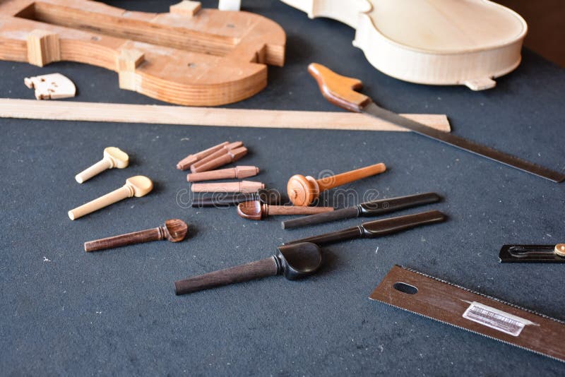The Materials Needed To Make a Handcrafted Violin are on the Table ...