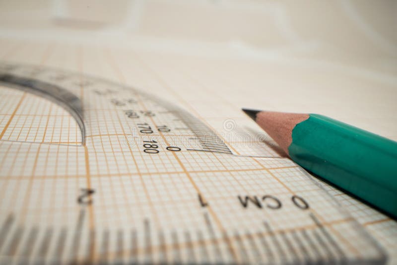 Math Concept - Macro of a Pencil on a Piece of Paper with Geometric ...