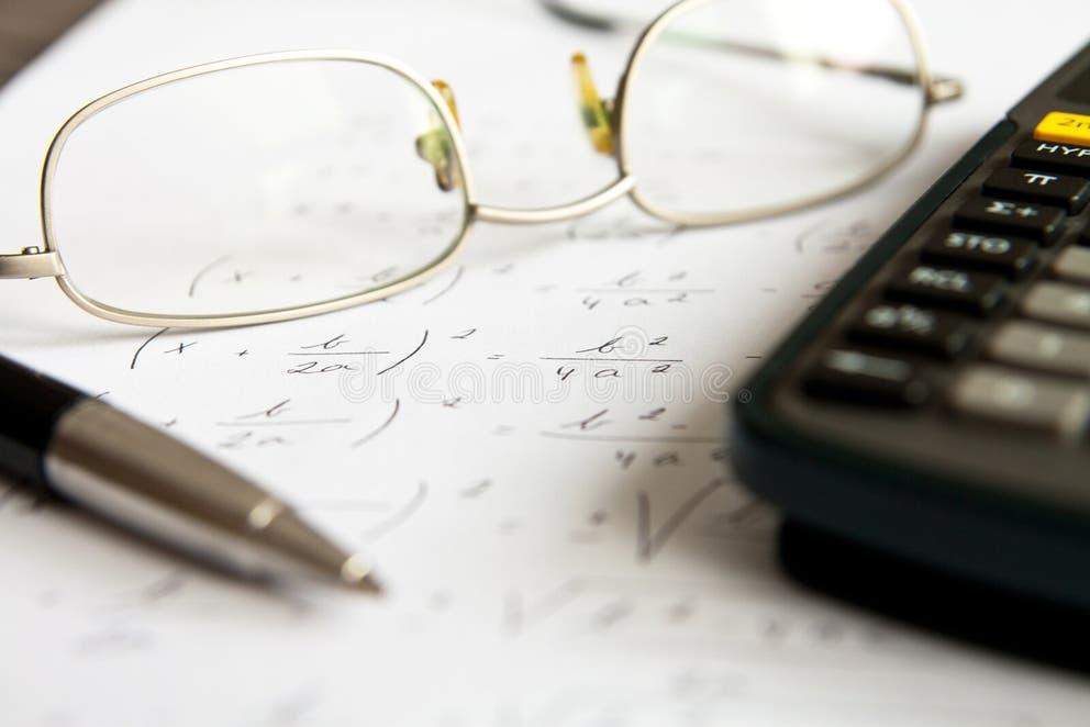 Math Exercise with Glasses, Calculator and Pen Stock Image - Image of ...
