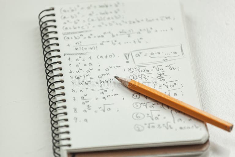 Math Formulas are Written in Pencil on a Piece of Paper, Math Problems ...