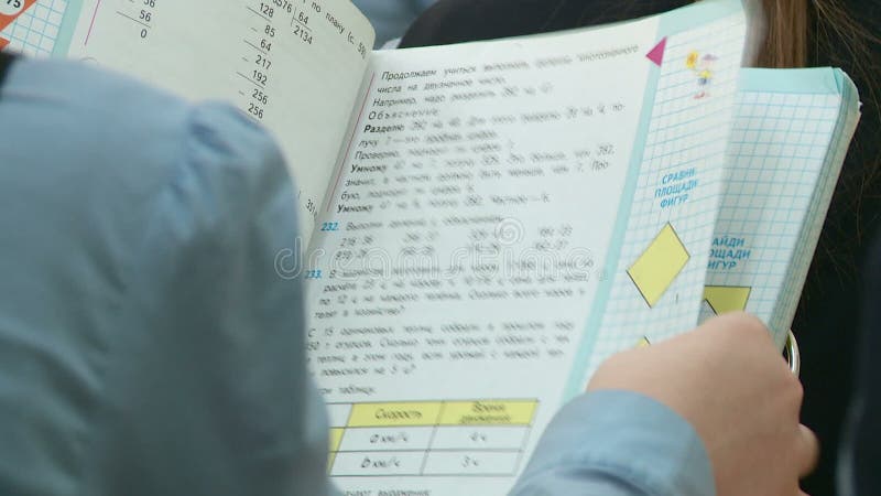 Math Lesson at School Children Solve Problems at the Blackboard and at ...