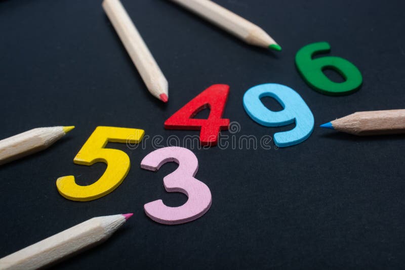 Math Numbers and Color Pencils for Mathematical Learning Stock Image ...