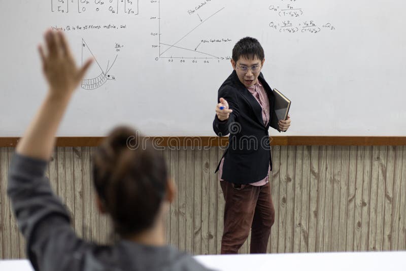 Math Or Physical Teacher Is Working On Teaching High School Students In ...