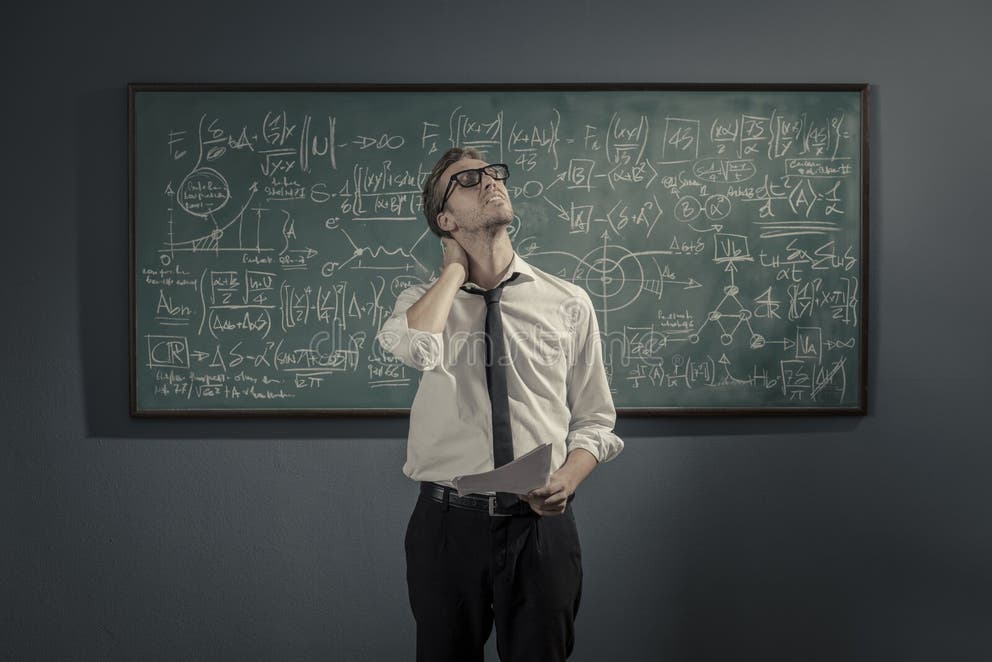 Math Student Standing in Front of the Chalkboard and Feeling Confused ...