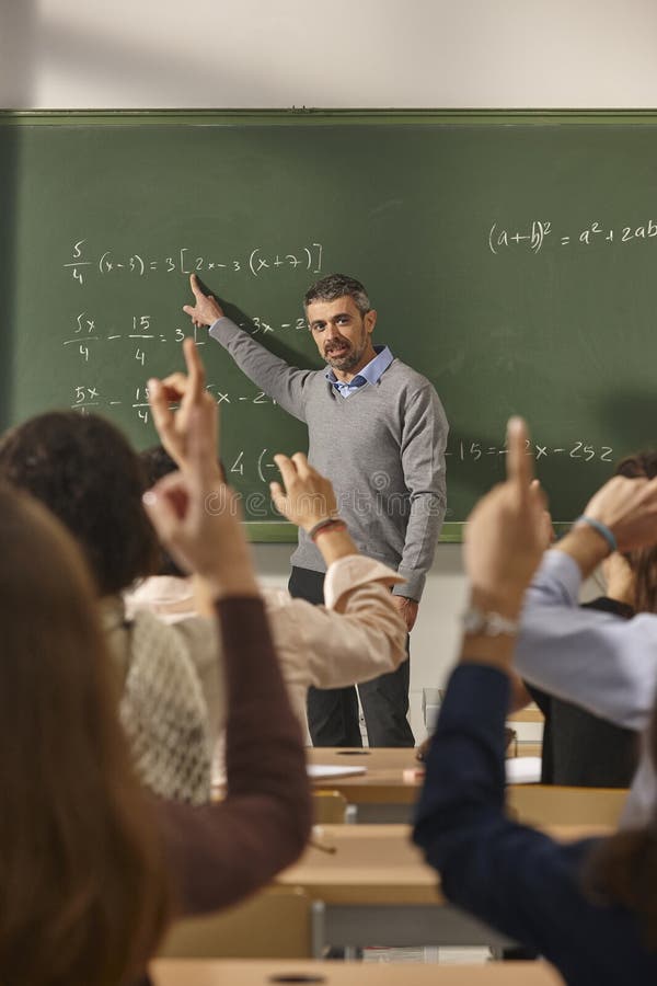 Math Teacher Giving Lessons. Classroom with Students. Elementary ...