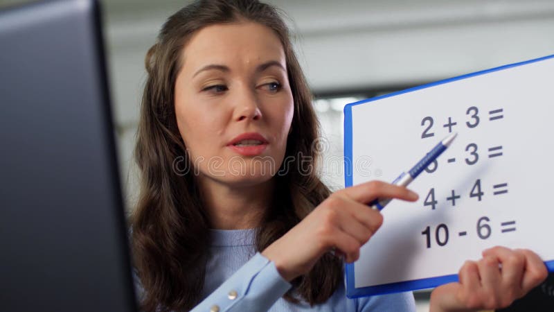 Math Teacher Having Online Class on Laptop at Home Stock Video - Video ...