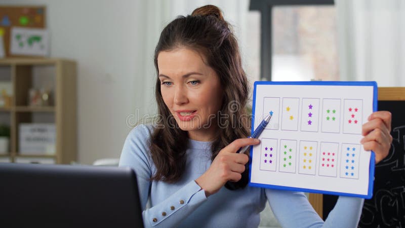 Math Teacher Having Online Class on Laptop at Home Stock Footage ...