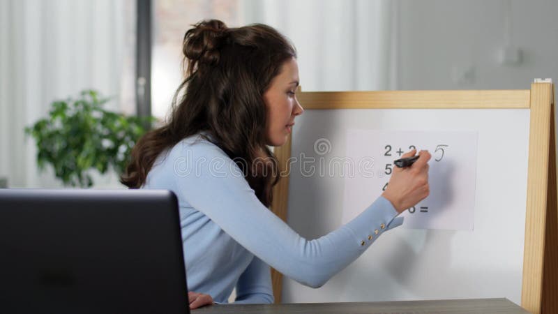 Math Teacher Having Online Class on Laptop at Home Stock Video - Video ...