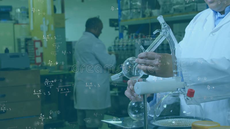 Mathematical Equations Moving Against Male Scientist Working in ...