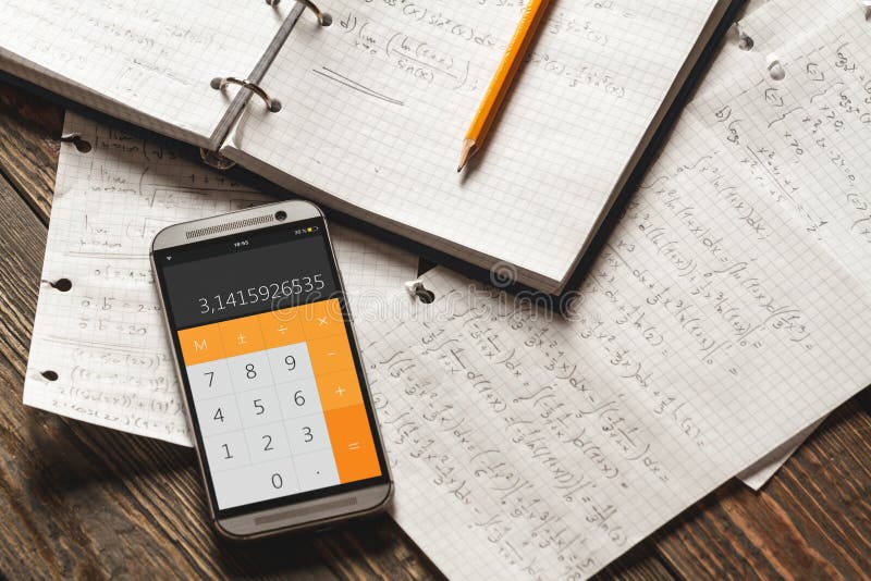 Mathematical Equations Written in a Notebook. Calculator App. Stock ...