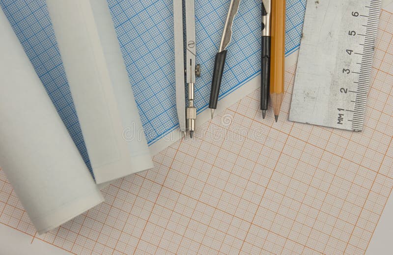Mathematical Instruments Over the Corner of a Math Graph Paper with ...