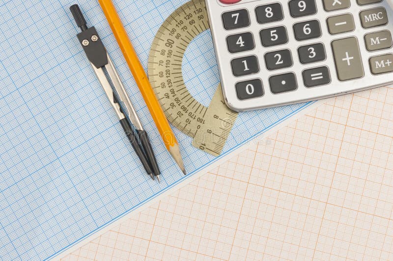 Mathematical Instruments Over the Corner of a Math Graph Paper with ...