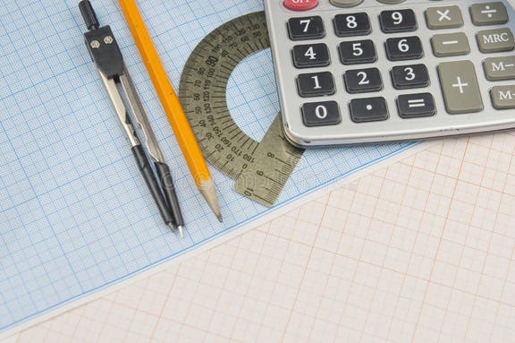 Mathematical Instruments Over the Corner of a Math Graph Paper with ...