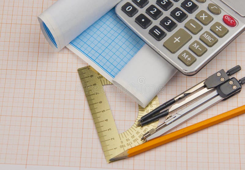 Mathematical Instruments Over the Corner of a Math Graph Paper with ...