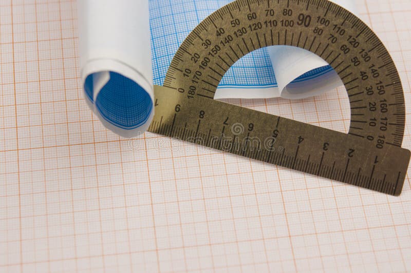 Mathematical Instruments Over the Corner of a Math Graph Paper with ...