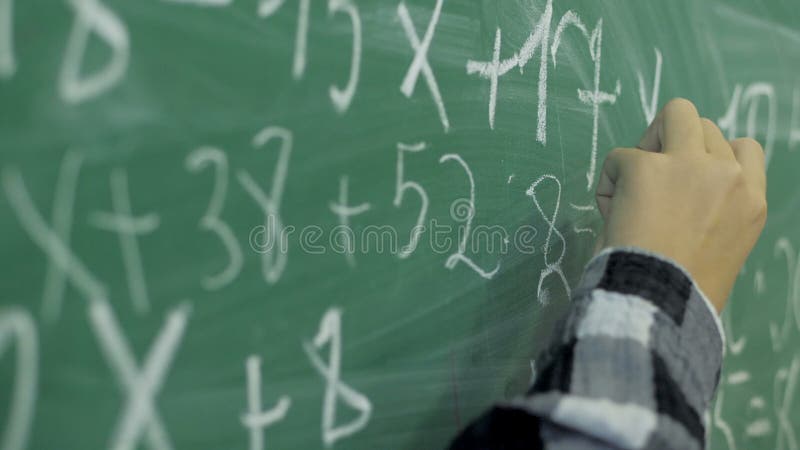 Maths` Chalkboard. Hand`s Writing Simple Mathematical Equation Stock ...