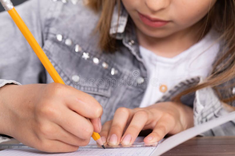 In the Maths Lesson, the Student Draws with a Pencil and Using a Ruler ...