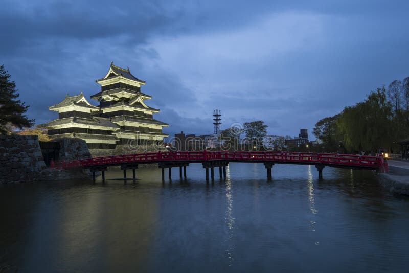 Matsumoto Castle with the Red Bridge at Night in Matsumoto, Japan Stock ...