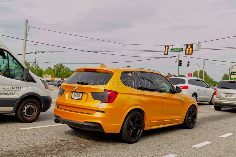 A Matte Gold BMW SUV with Custom Tags Editorial Image - Image of ...