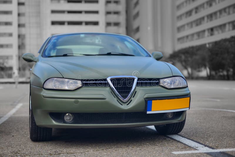 A matte green Italian car editorial stock image. Image of color - 284754089