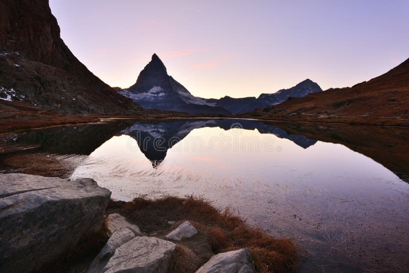 Matterhorn Peak Reflected in Riffelsee at Sunset Stock Photo - Image of ...